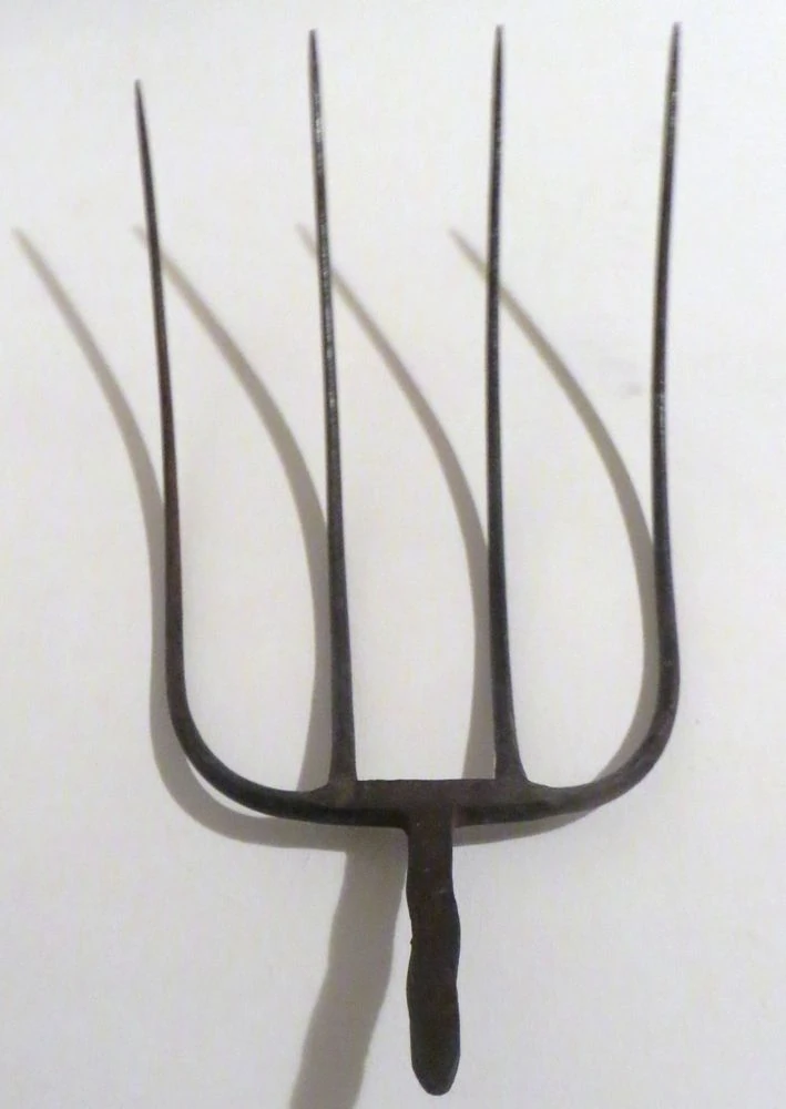 Robert Frost's Pitchfork | Warehouse 13 Artifact Database Wiki | Fandom