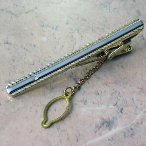 Way Bandy's Tie Clip | Warehouse 13 Artifact Database Wiki | Fandom