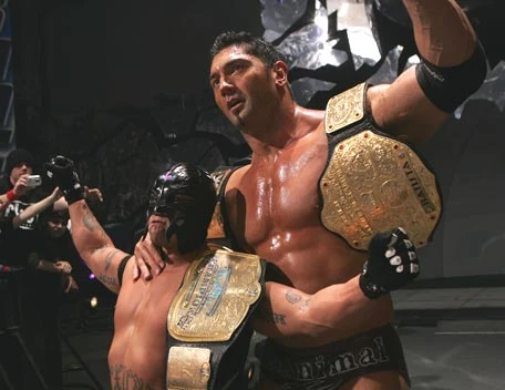 Batista And Rey Mysterio Hug